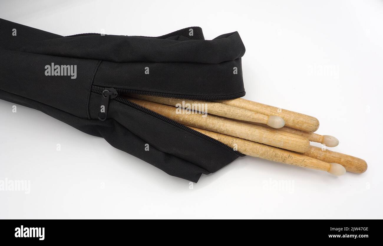 Drum sticks which made from real wood material and black color fabric ...