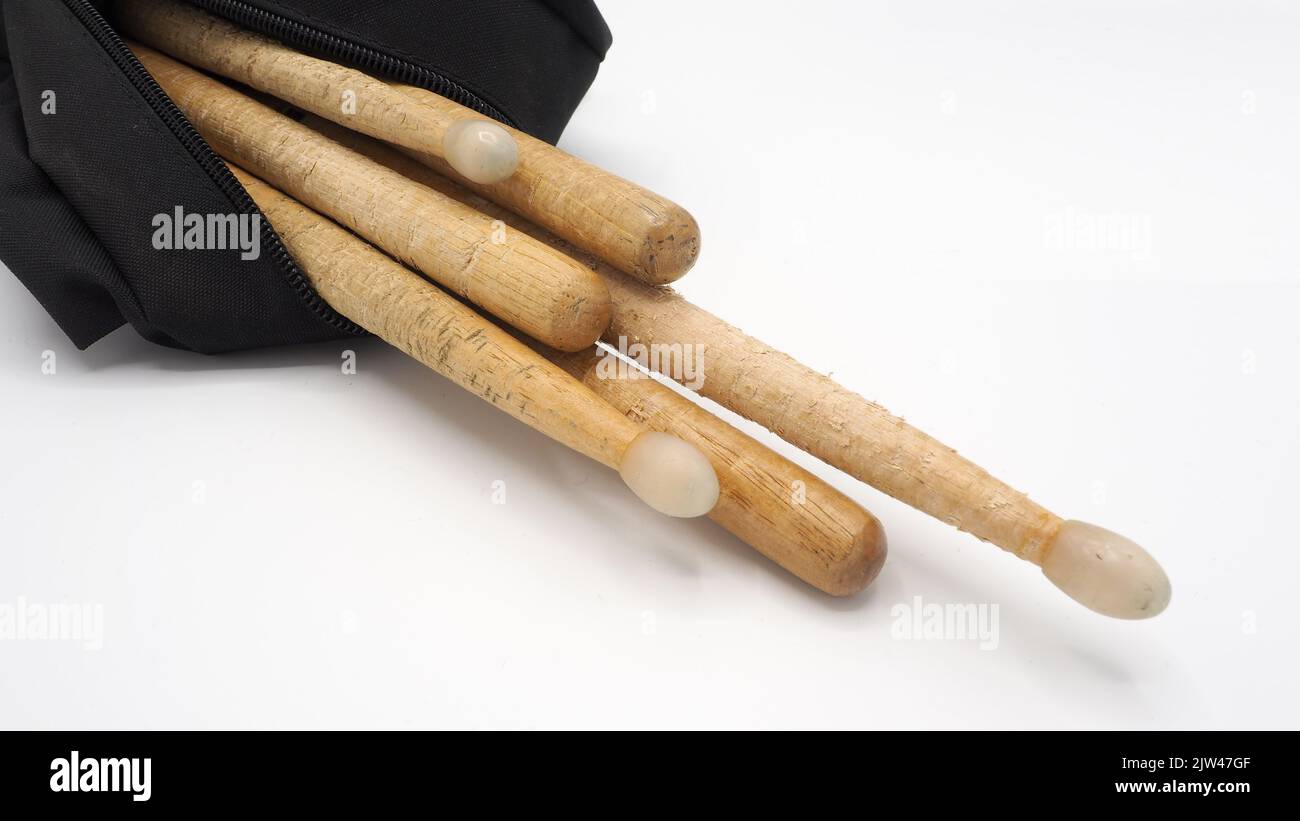 Drum sticks which made from real wood material and black color fabric ...