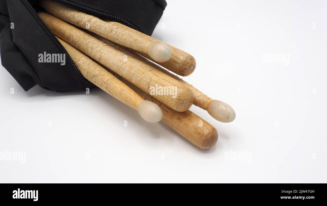 Drum sticks which made from real wood material and black color fabric ...