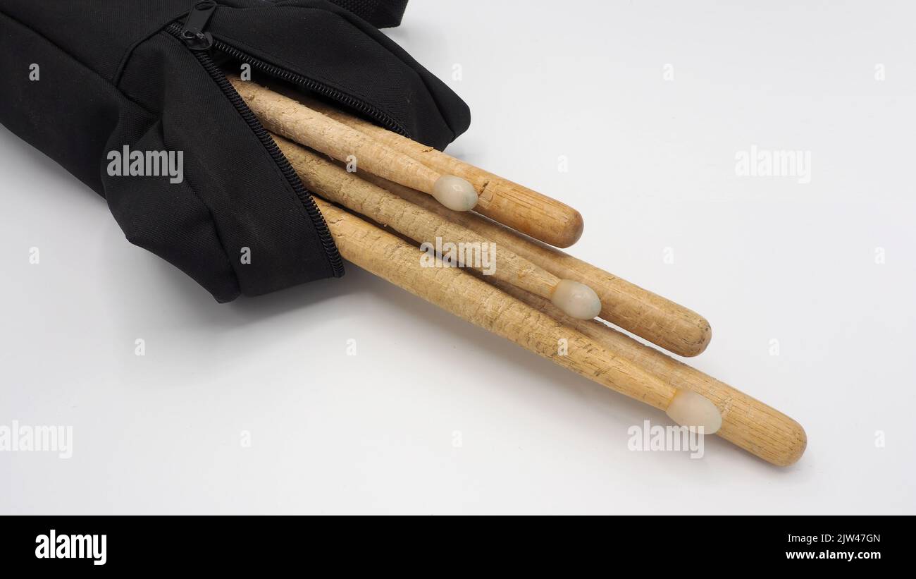 Drum sticks which made from real wood material and black color fabric ...
