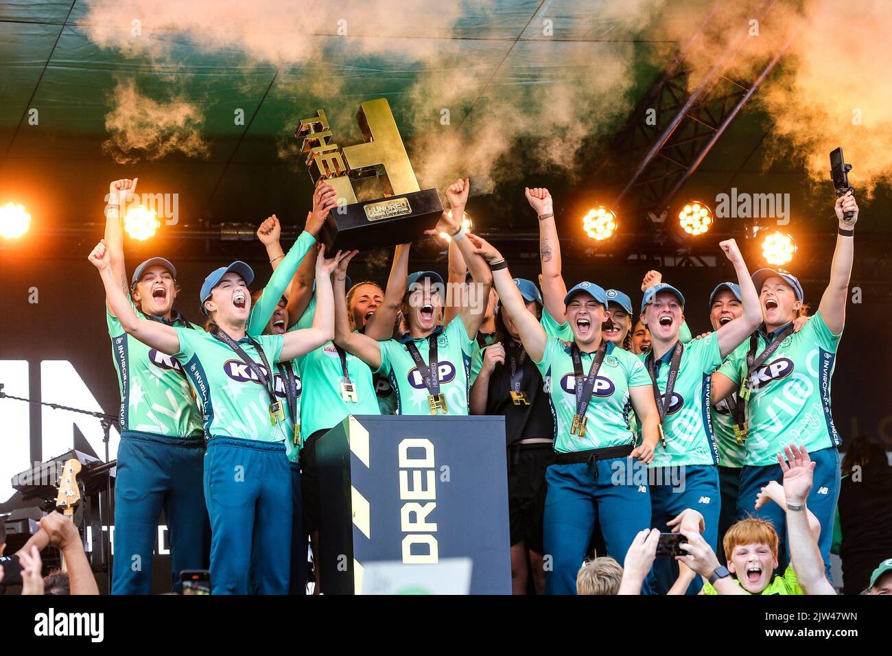 Oval Invinciples players celebrate winning with the trophy during the ...