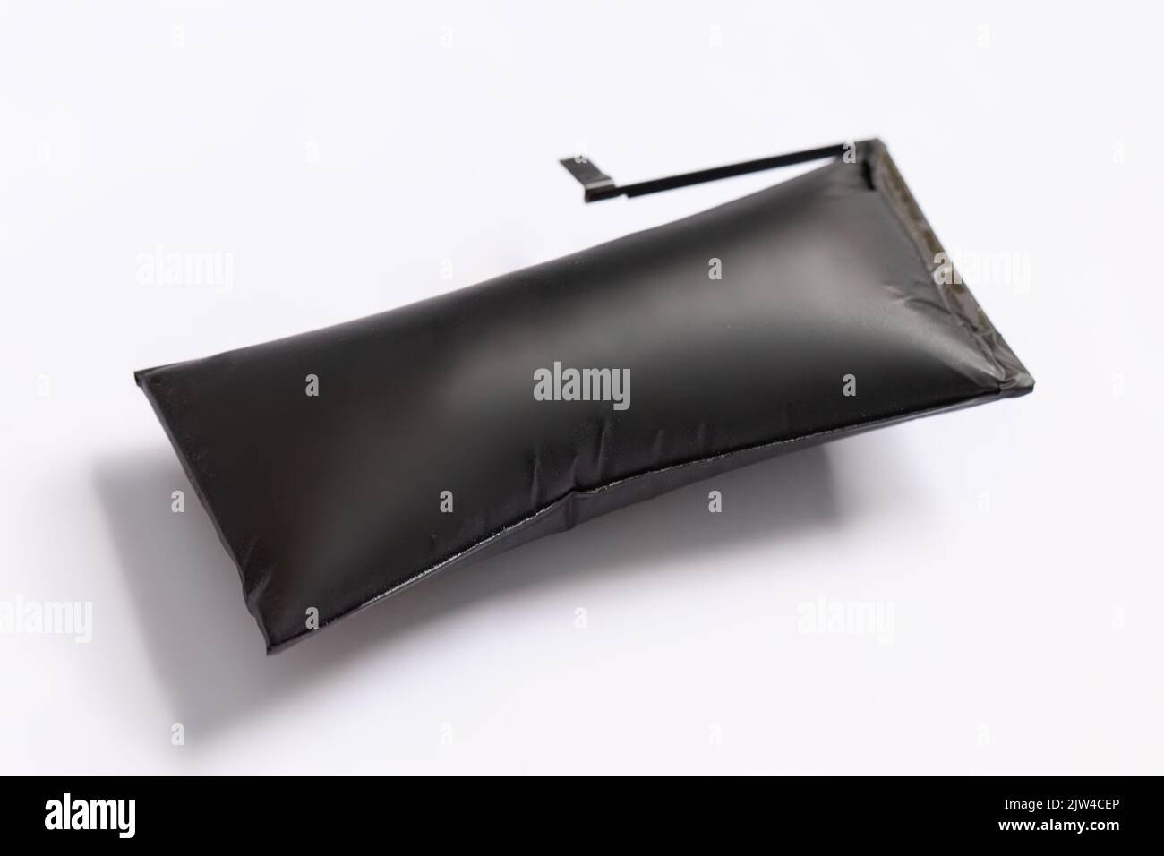 Swollen smartphone battery. Damaged smartphone battery Stock Photo - Alamy