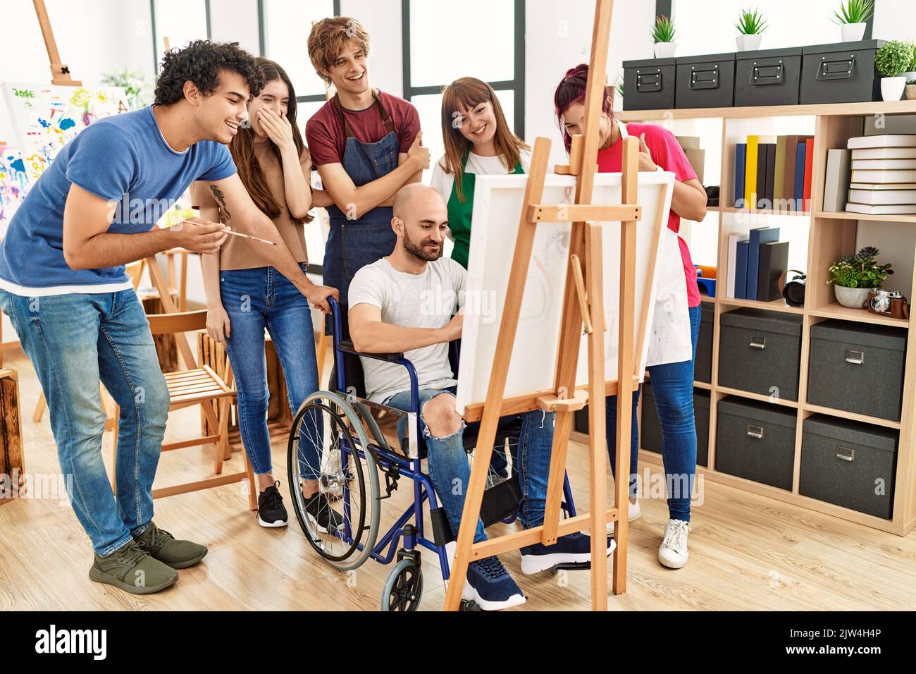 Group of young paint students smiling happy and looking draw of ...