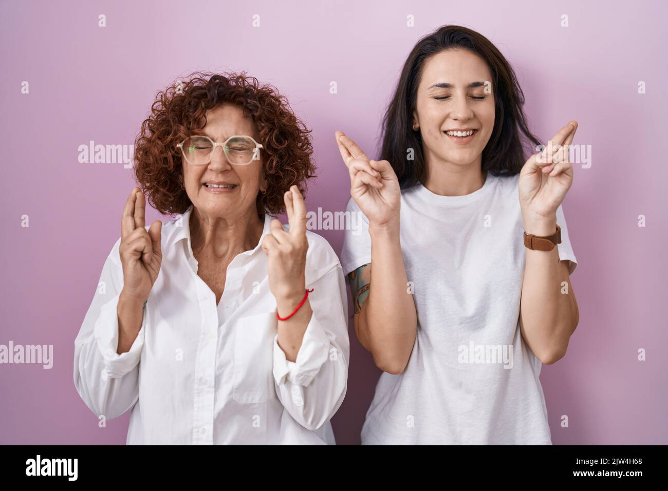 Crossed fingers parent hi-res stock photography and images - Alamy