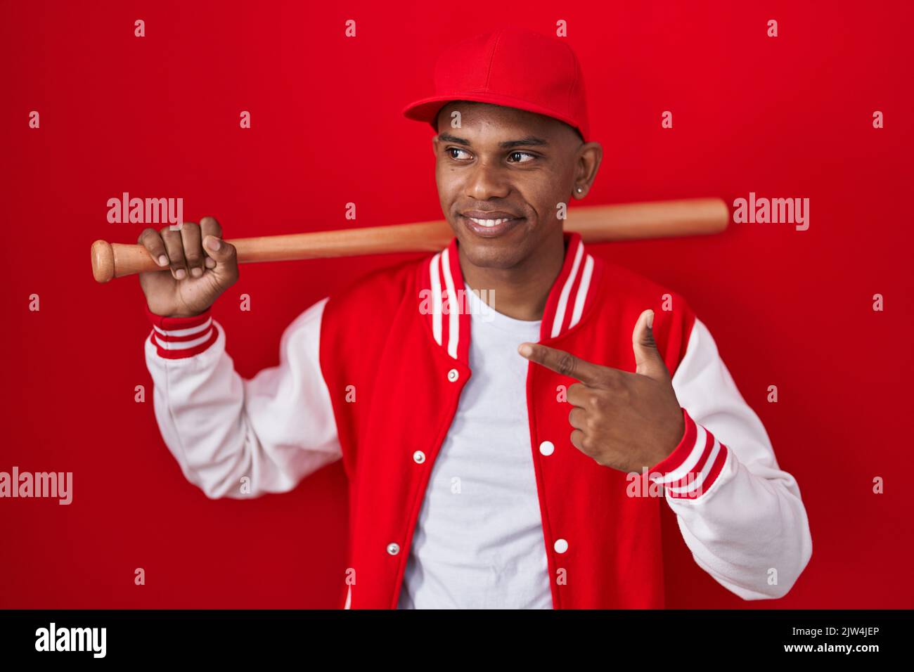 Man baseball bat behind back hi-res stock photography and images - Alamy