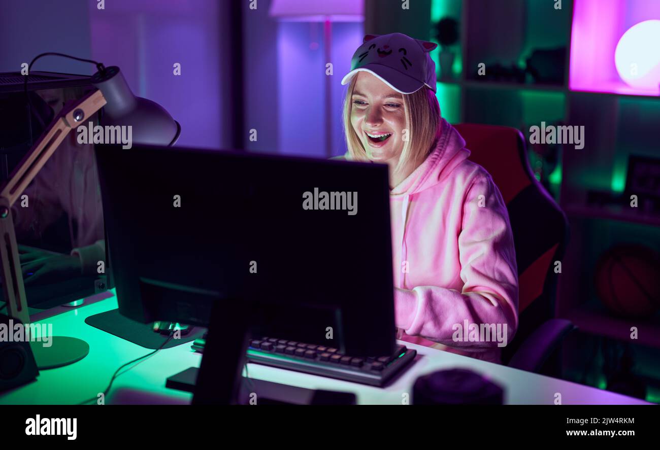 Young blonde woman streamer using computer at gaming room Stock Photo ...