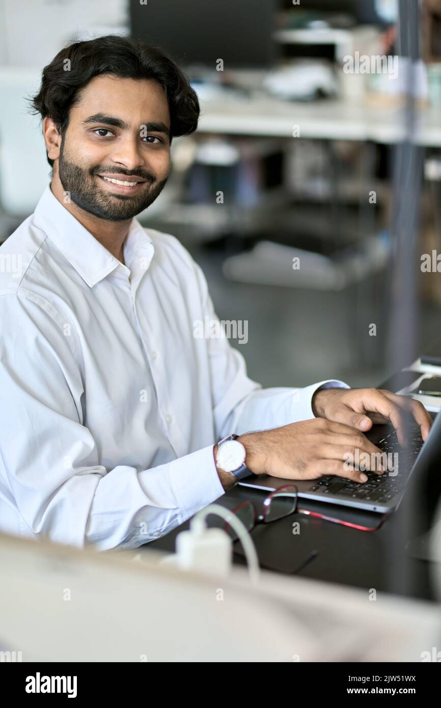 Happy indian using laptop hi-res stock photography and images - Alamy