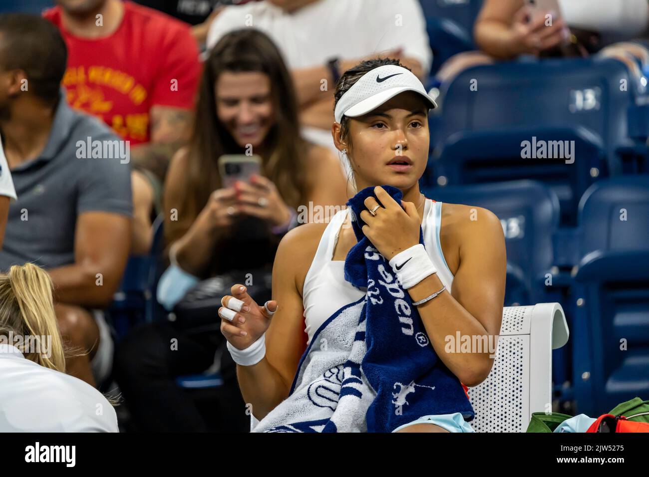 Emma Raducanu (GBR) having blisters on her hand attended to during her ...