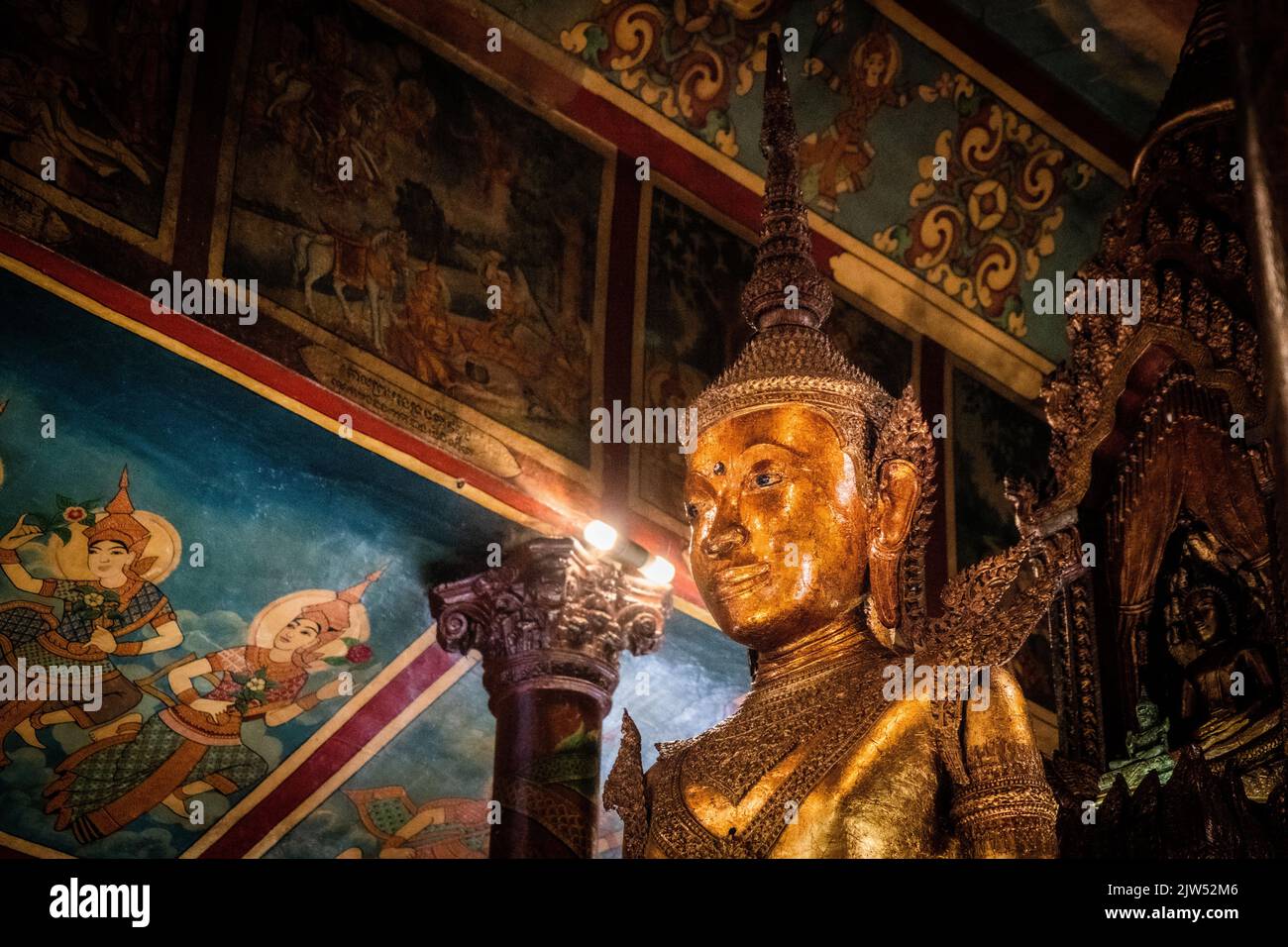 The head of a large golden Buddha statue is seen at Wat Phnom in Phnom ...