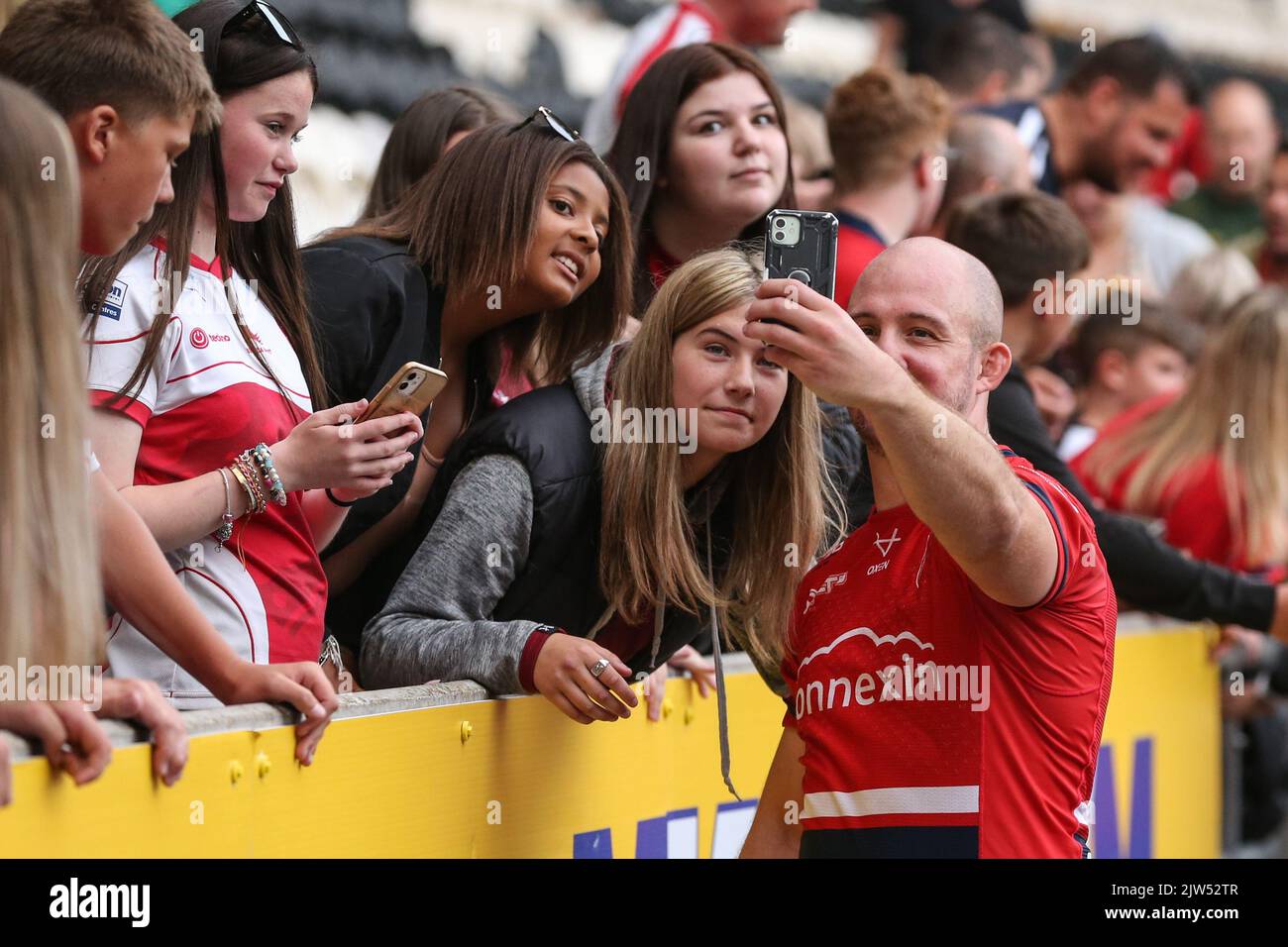 George King #10 of Hull KR has a photo taken with a Hull KR fan after ...