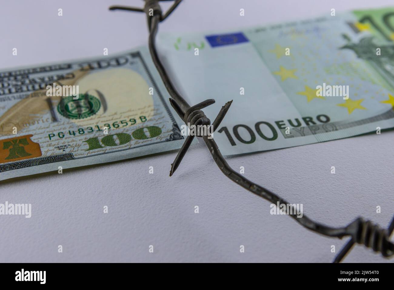 Euro vs dollar with barbed wire hi-res stock photography and images - Alamy
