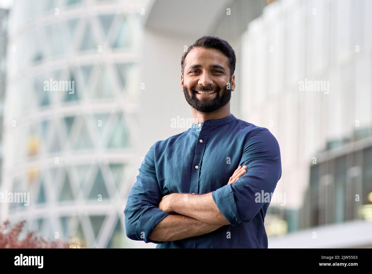 Indian man standing outside the bank hi-res stock photography and ...