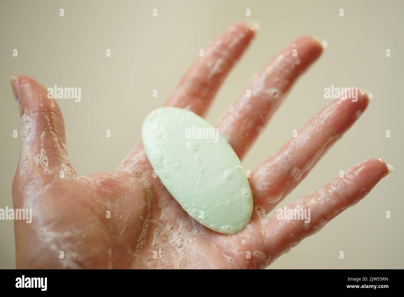 Female hands hold bar hi-res stock photography and images - Alamy