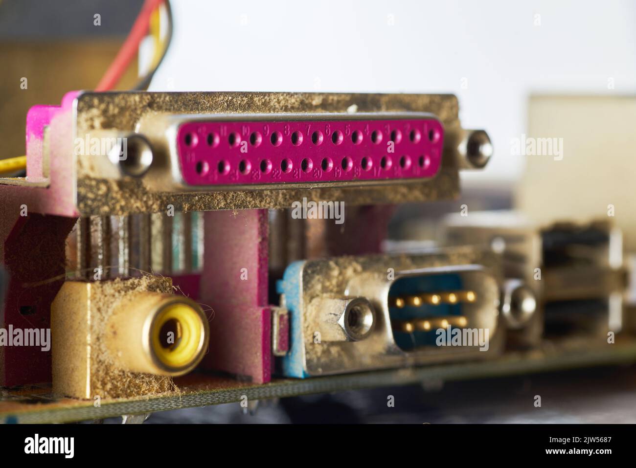 A thick layer of dust covers the internal electronic components of the ...