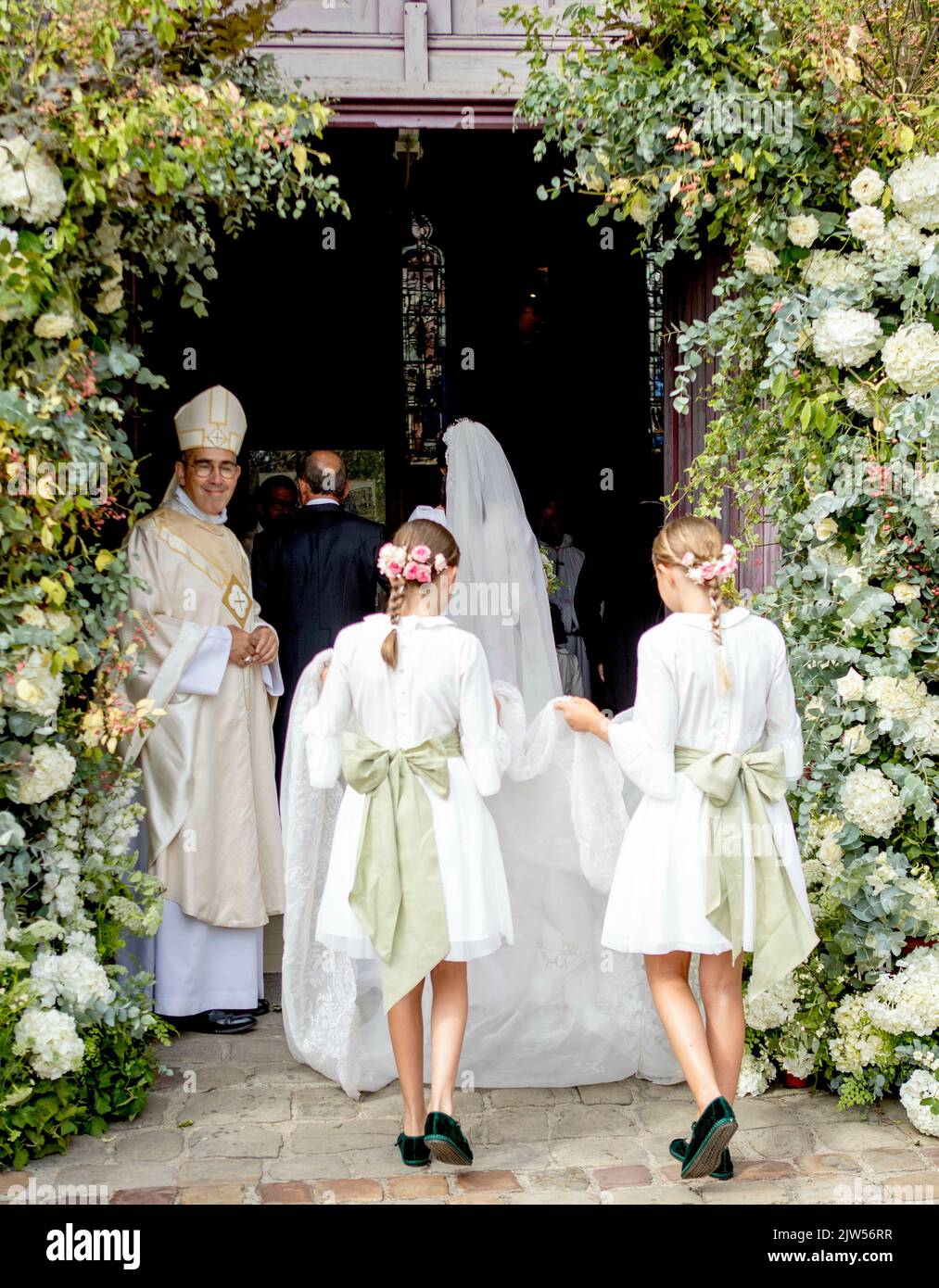 Caroline Philippe and her father arrive at the Eglise Saint-Michel in ...