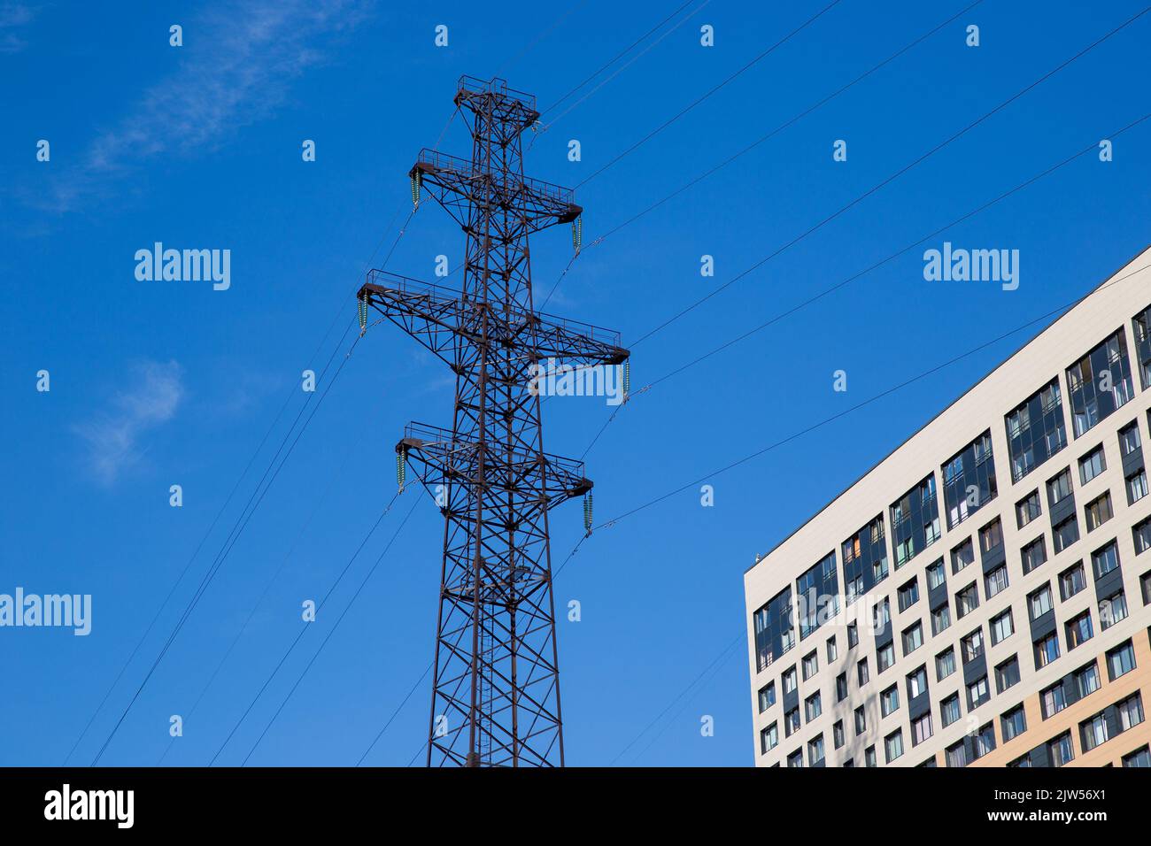 Electricity and lighting. Supports of a high-voltage power line in the ...