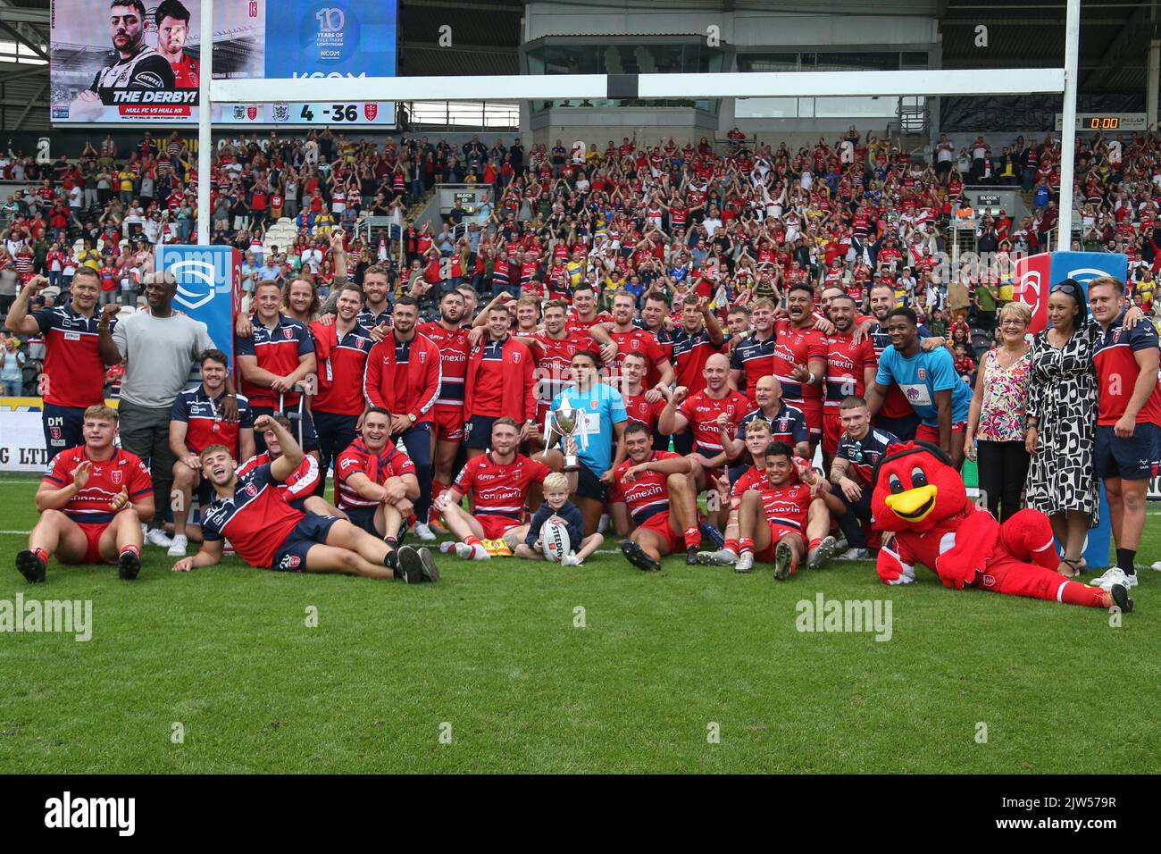 Hull KR players receive the Clive Sullivan trophy after the Betfred ...