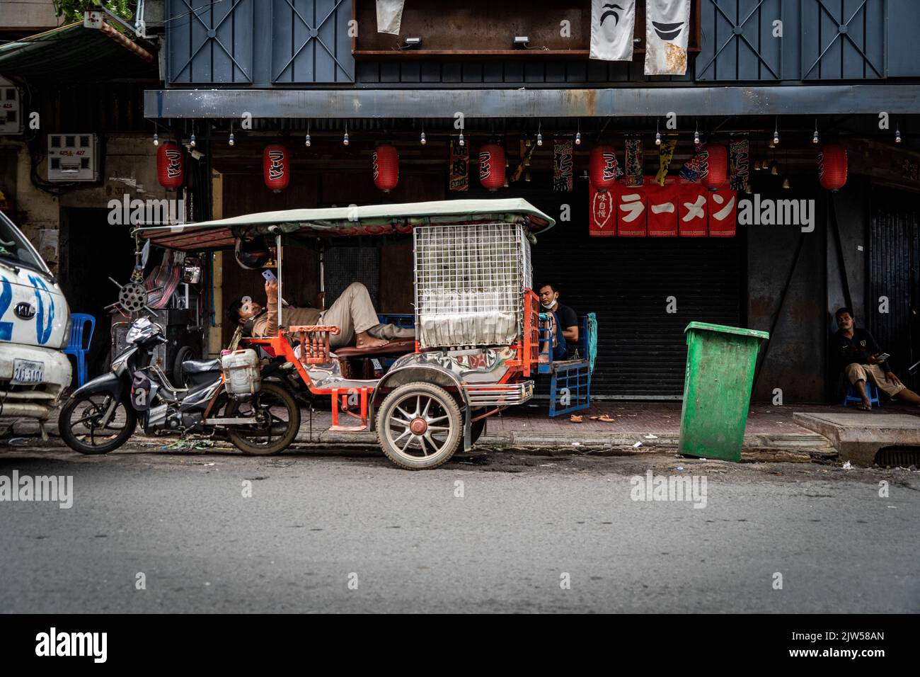 Phnom Penh, Cambodia. 3rd Sep, 2022. A Tuk Tuk driver takes a break in ...