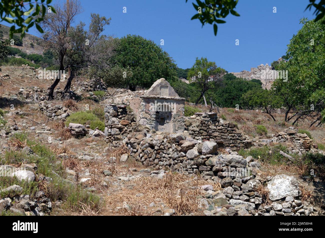 Small stone spring on path to Micro Chorio abandoned village. Tilos ...