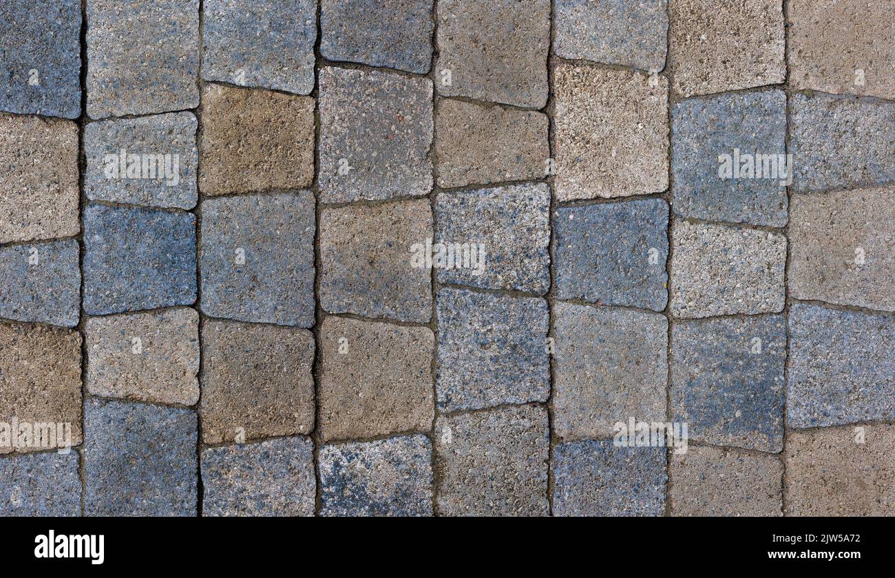 colored trapezoid concrete tiles pavement in high angle view - full ...