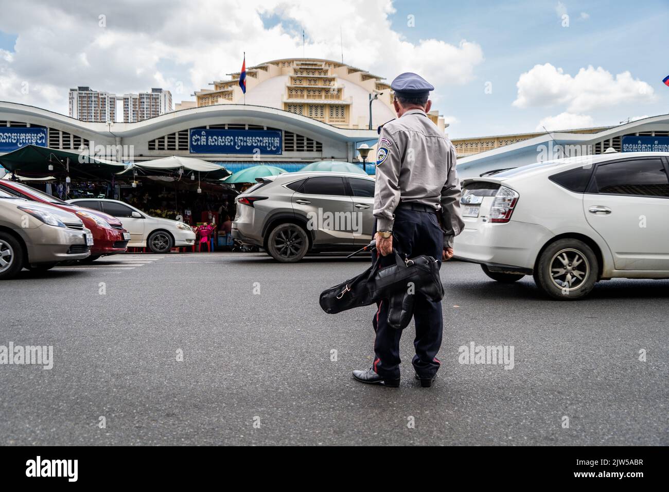 Phnom Penh, Cambodia. 3rd Sep, 2022. A security guard carrying a rifle in a shotgun tote bag ...