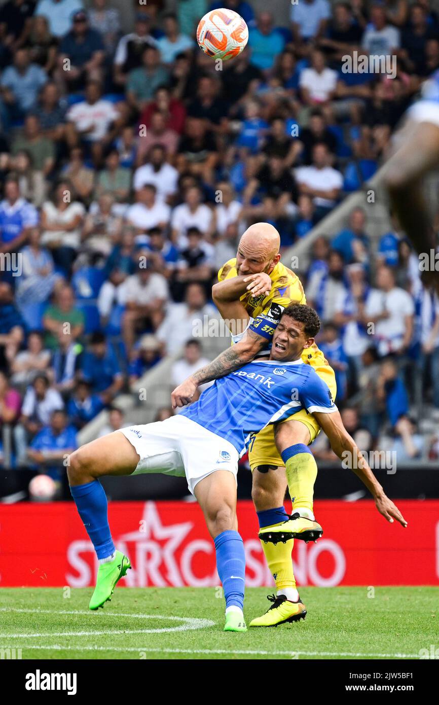 Genk's Andras Nemeth and STVV's Toni Leistner fight for the ball during ...