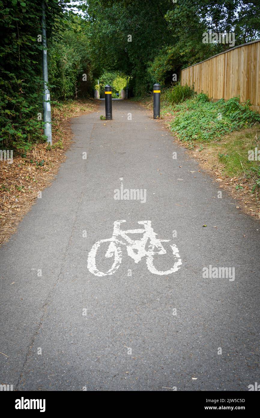 Sign marking bike path on the sidewalk Stock Photo - Alamy