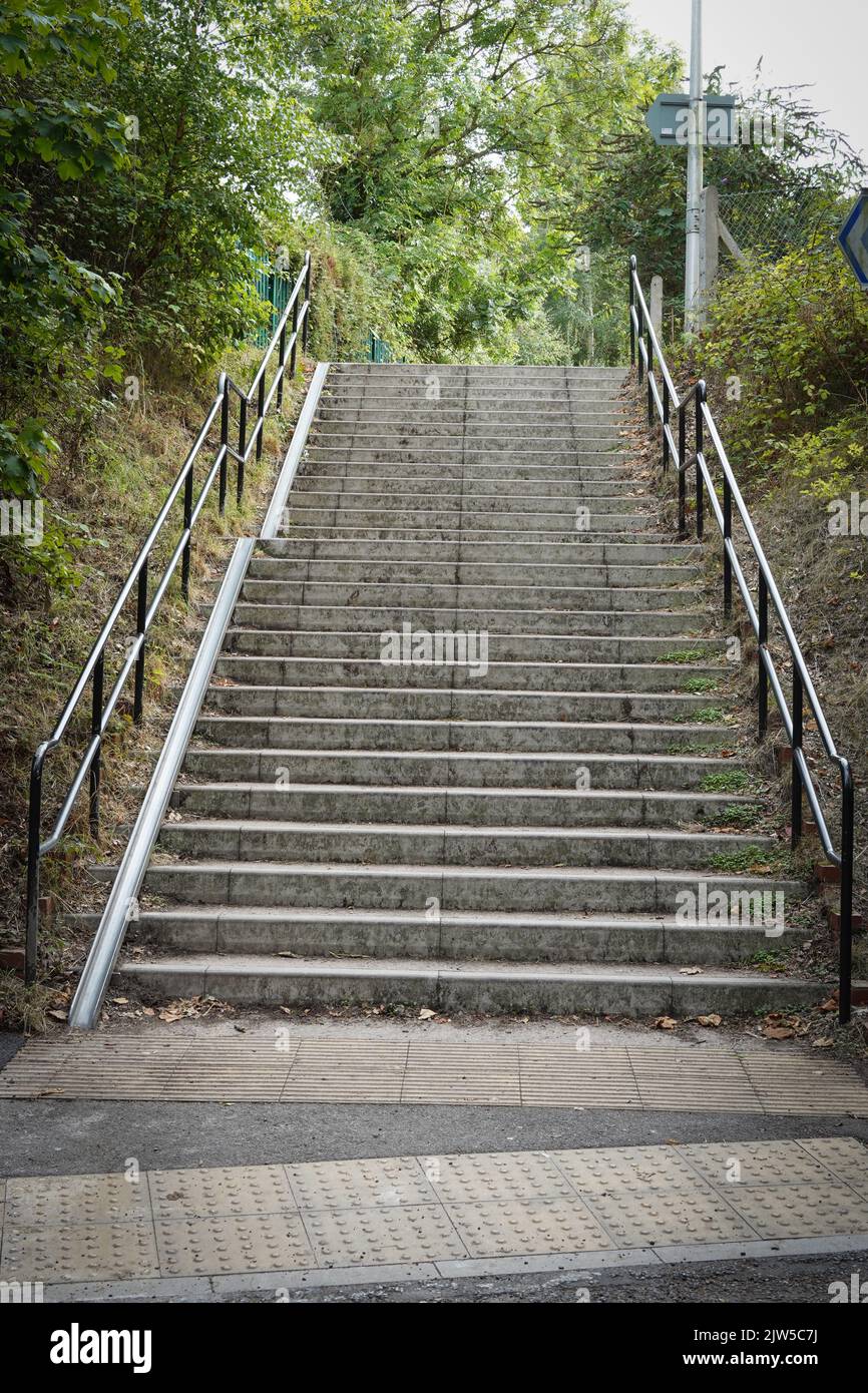 Concrete steps, stairs, with metal track or ramp for bicycles Stock ...