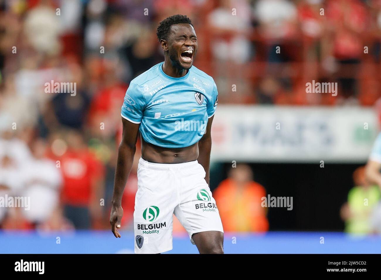 Oostende's David Atanga reacts during a soccer match between Standard ...