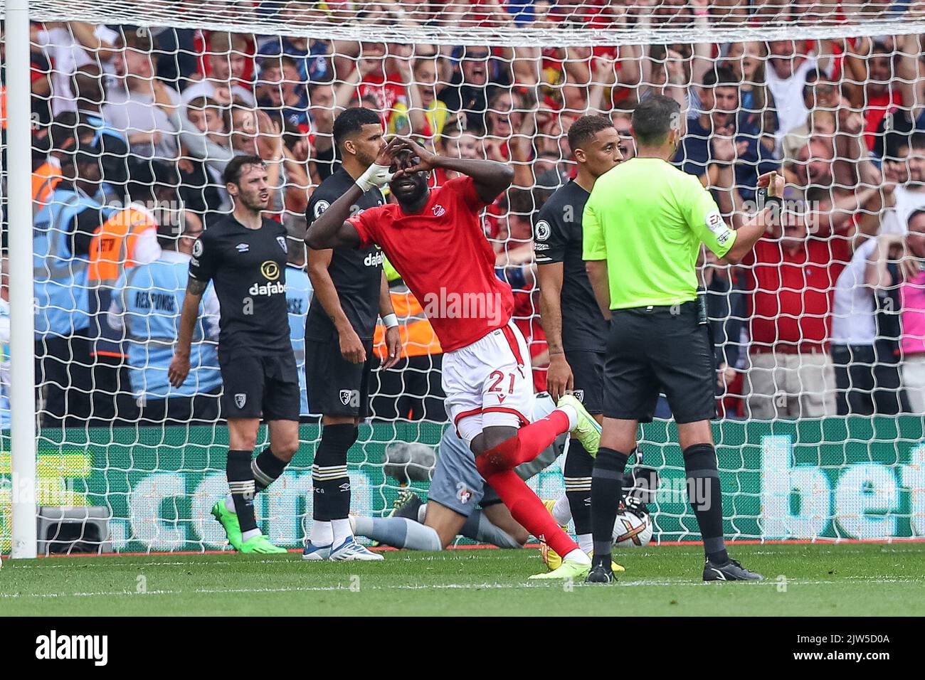 Cheikhou Kouyate #21 of Nottingham Forest celebrates his goal to make ...