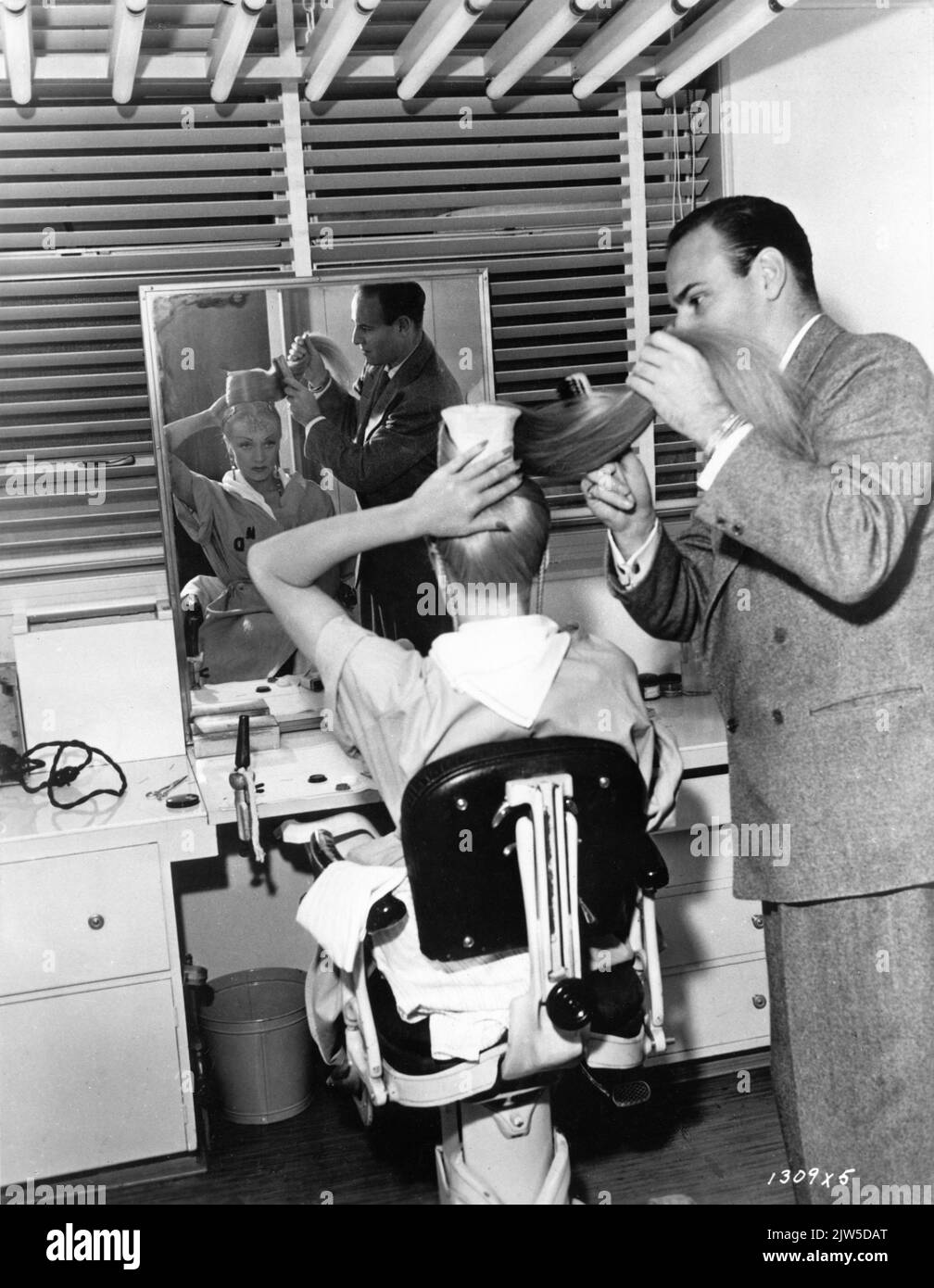 MARLENE DIETRICH having her hair styled / arranged by SYDNEY GUILAROFF ...