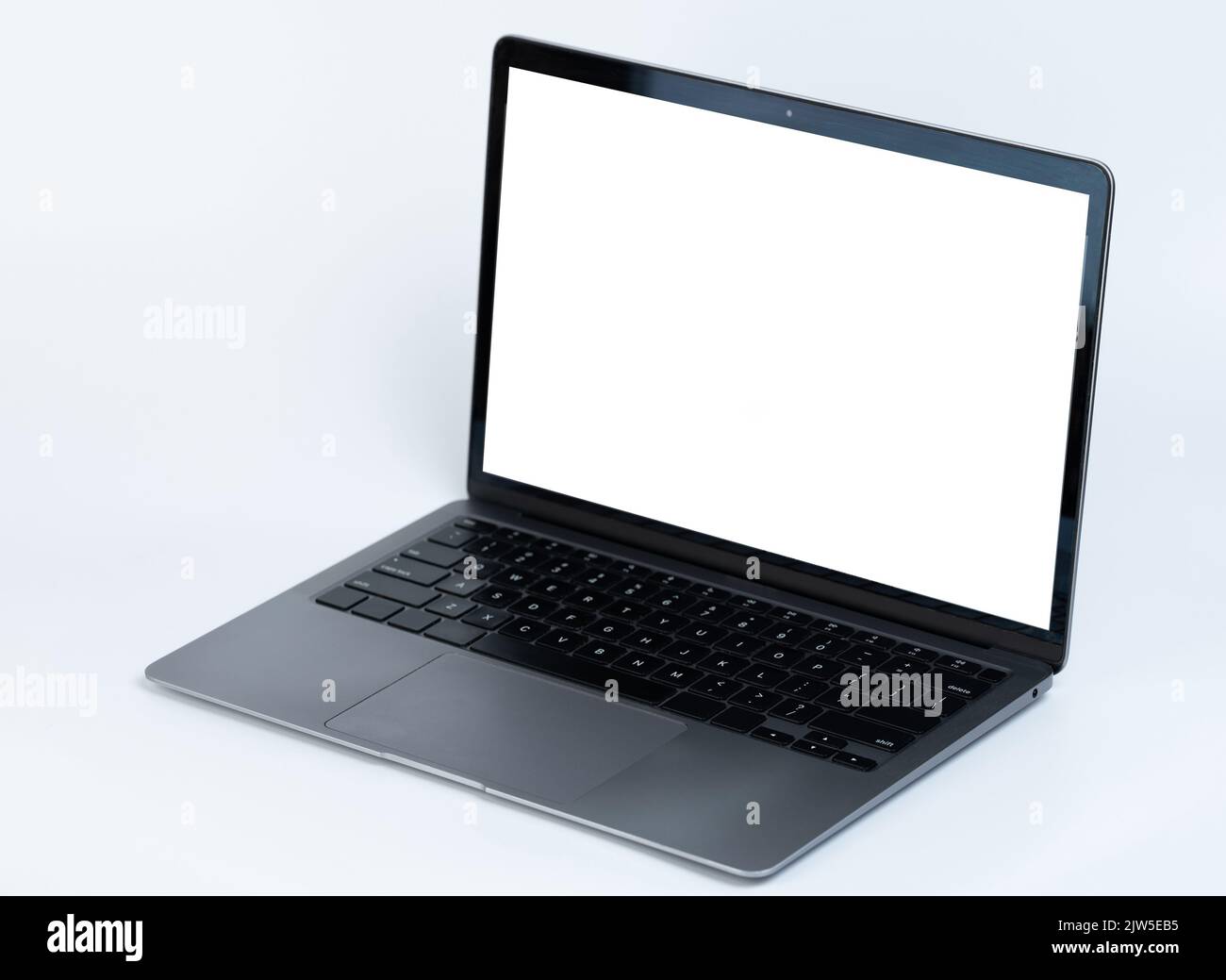 Grey open slim laptop isolated isometric view on studio background ...