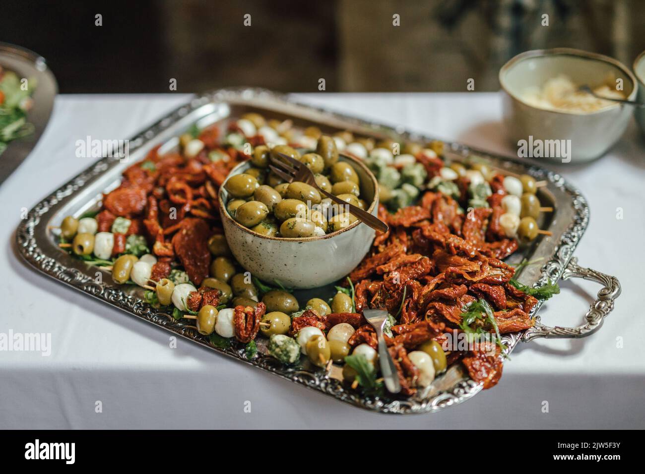 Delicious olives at a buffet table Stock Photo - Alamy