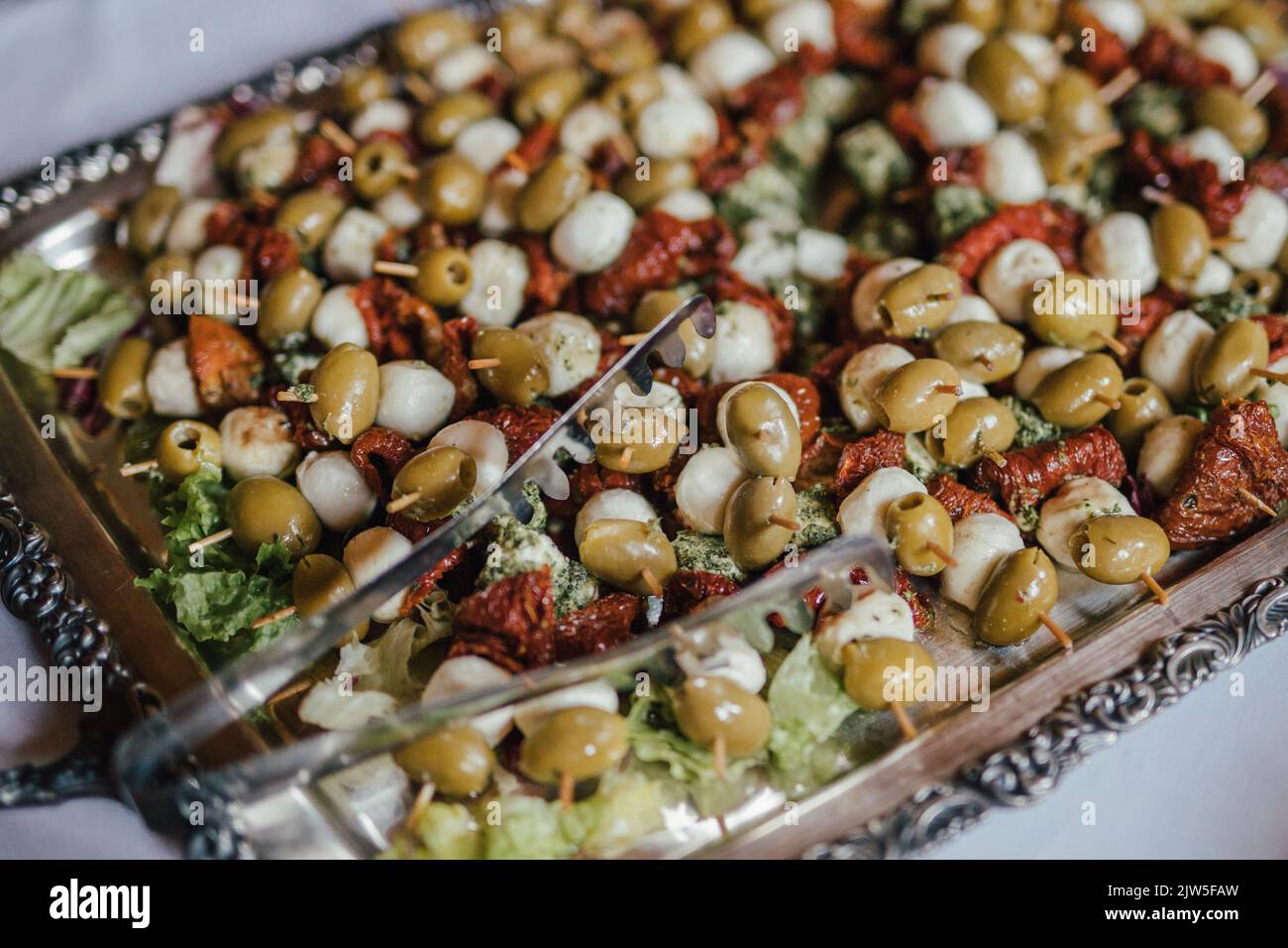 Delicious olives at a buffet table Stock Photo - Alamy