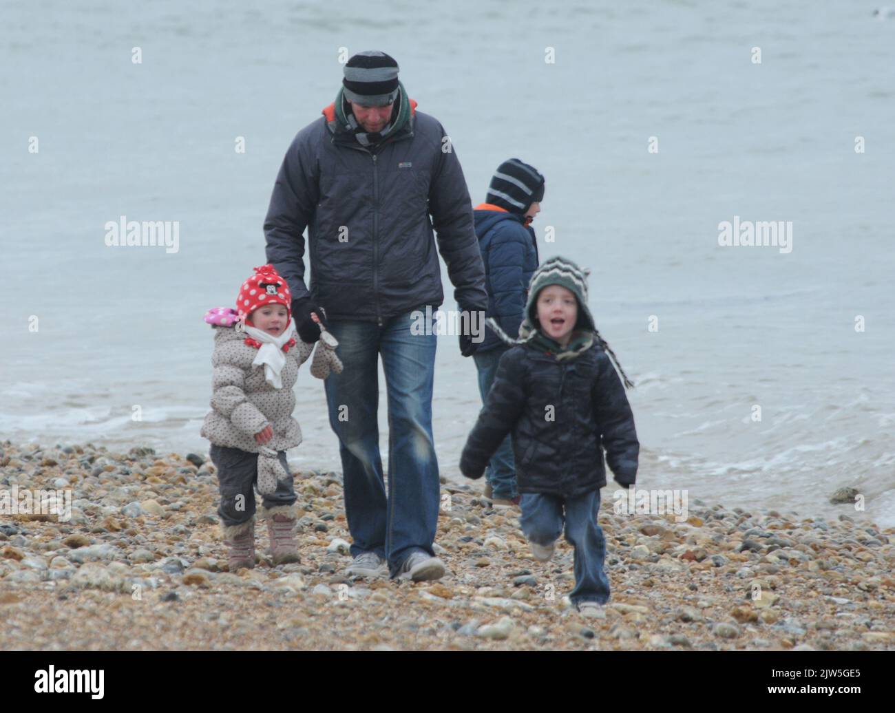 FUN ON THE BEACH DESPITE THE BITING WIND AND FREEZING TEMPERATURES ON ...
