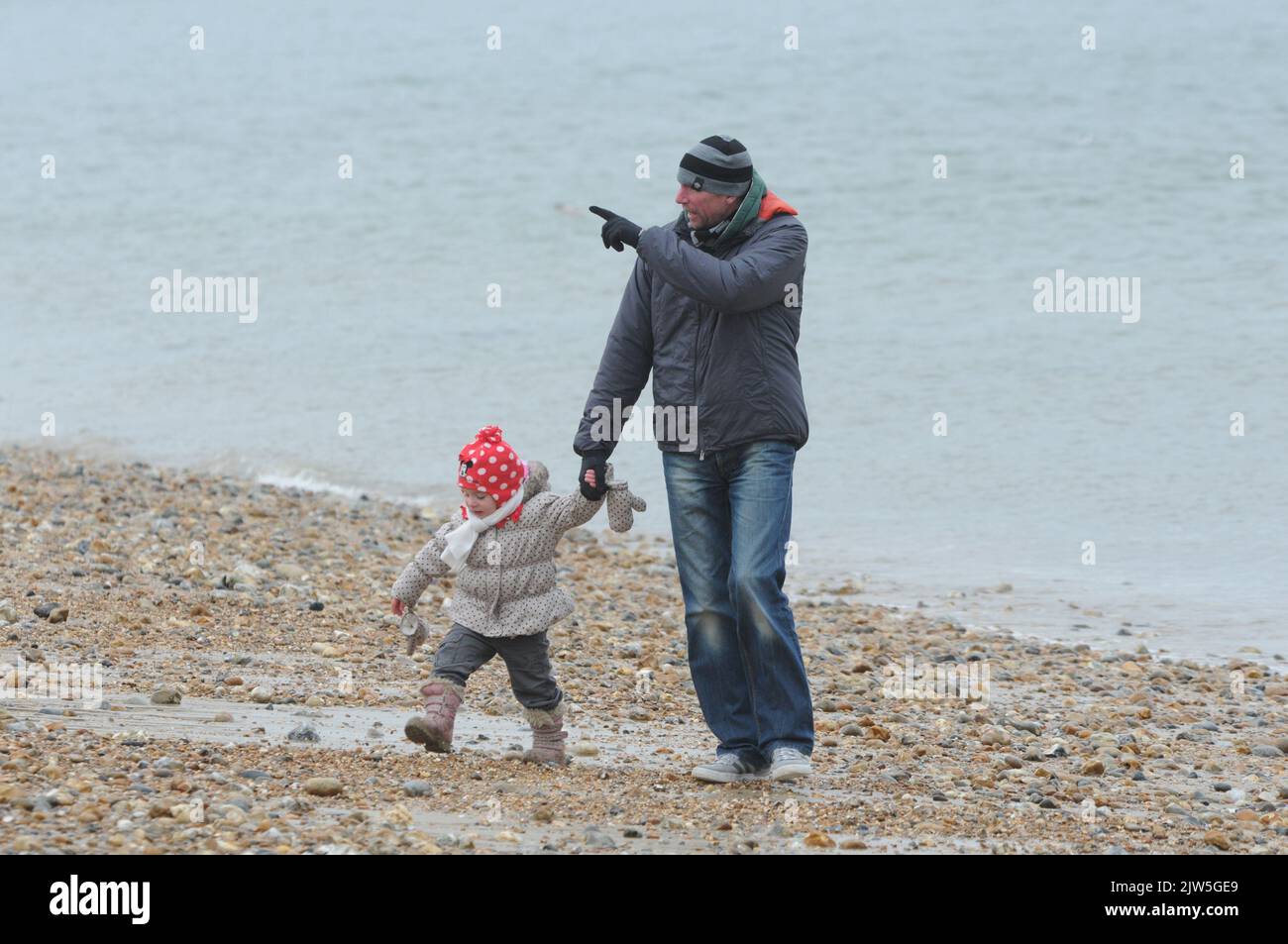 FUN ON THE BEACH DESPITE THE BITING WIND AND FREEZING TEMPERATURES ON ...