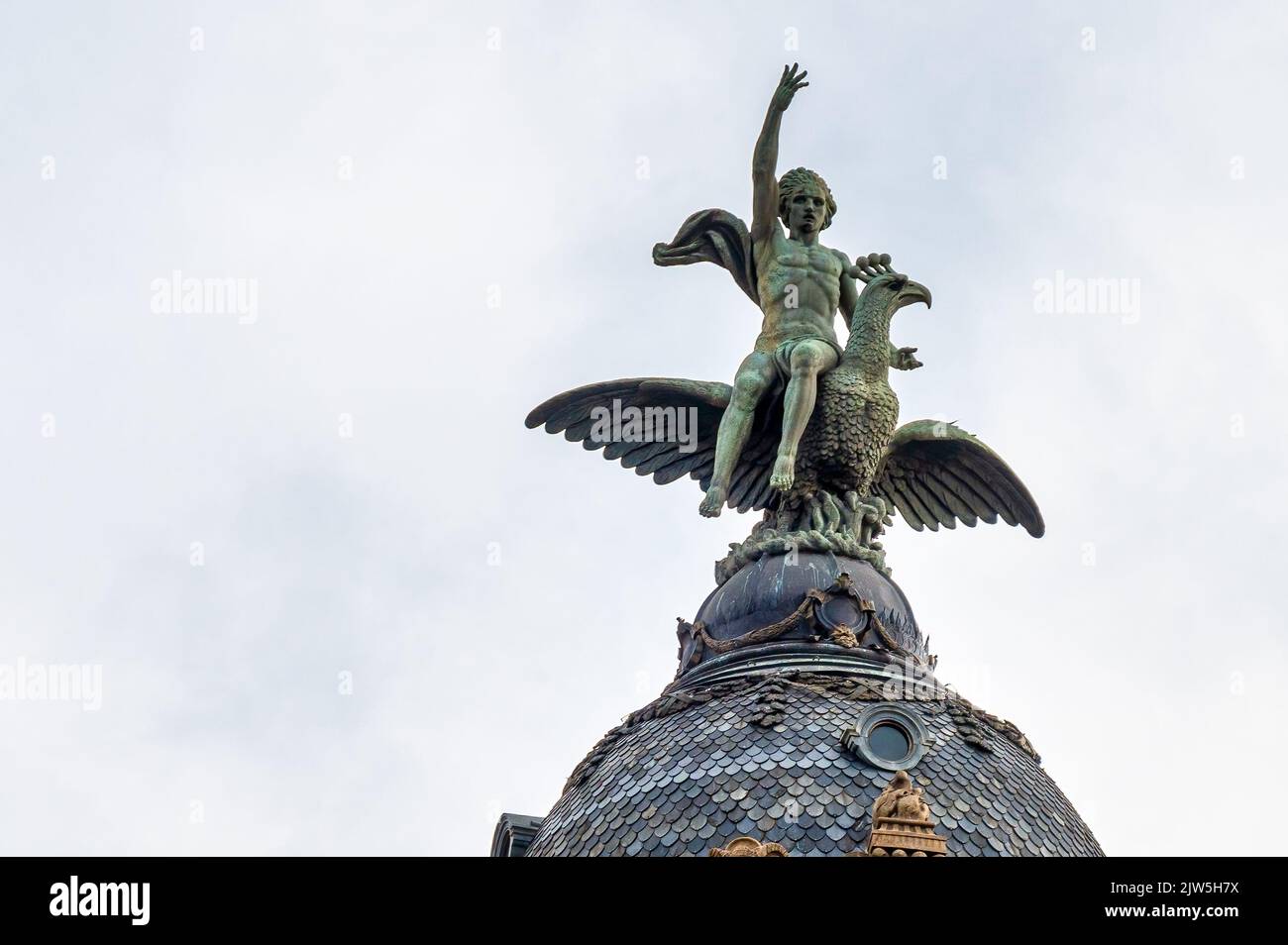 Sculpture of an angel on top of a bird. The capital decoration is part ...