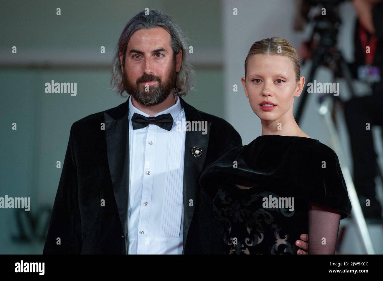 Mia Goth and Ti West arriving at the Pearl Premiere during the 79th Venice International Film ...