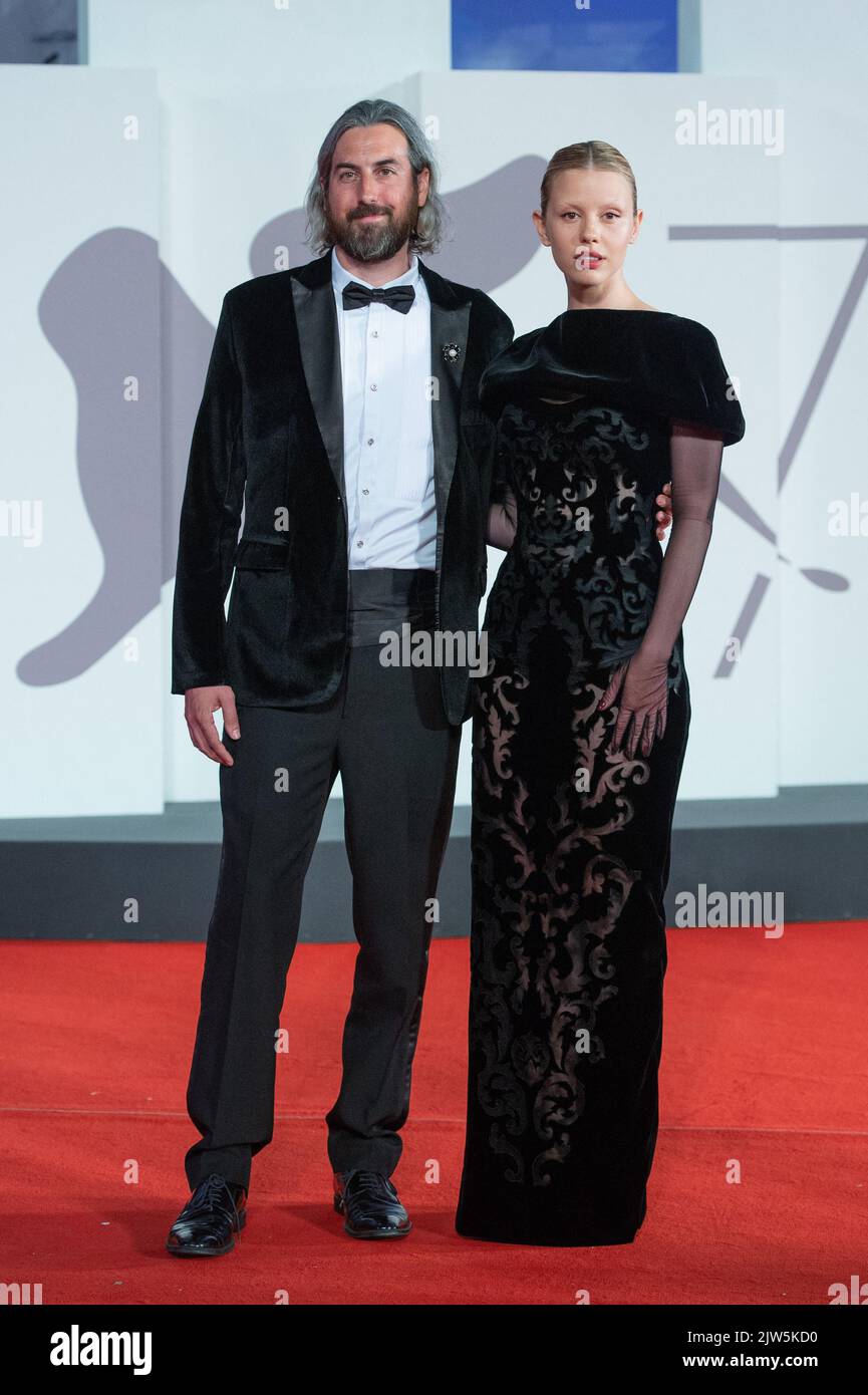 Mia Goth and Ti West arriving at the Pearl Premiere during the 79th Venice International Film ...