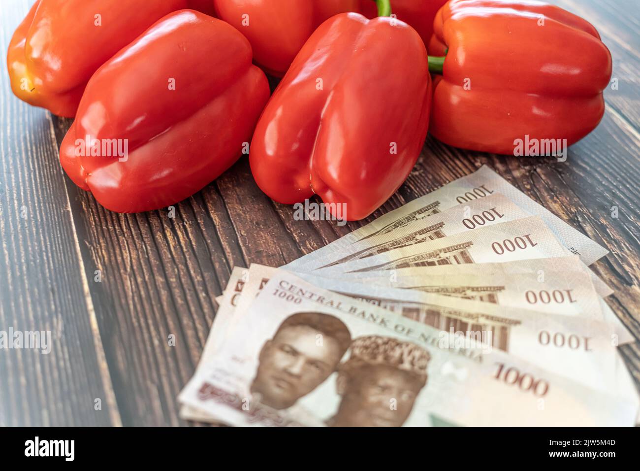 Bell Peppers with Nigerian Naira notes on display Stock Photo - Alamy