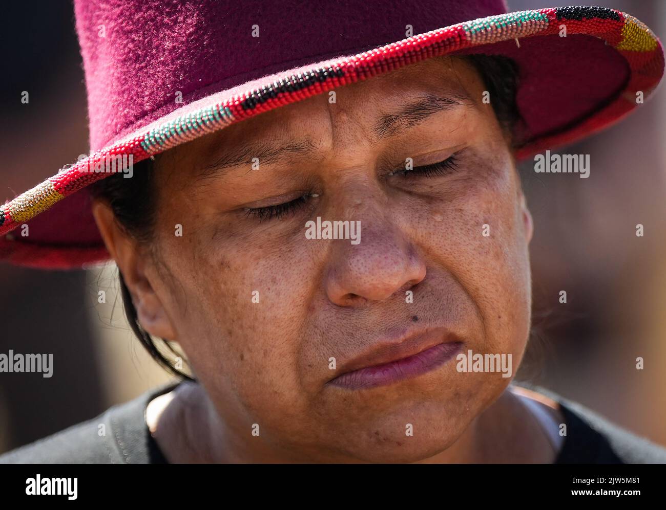 Sheila Poorman cries while speaking during a vigil for her daughter ...