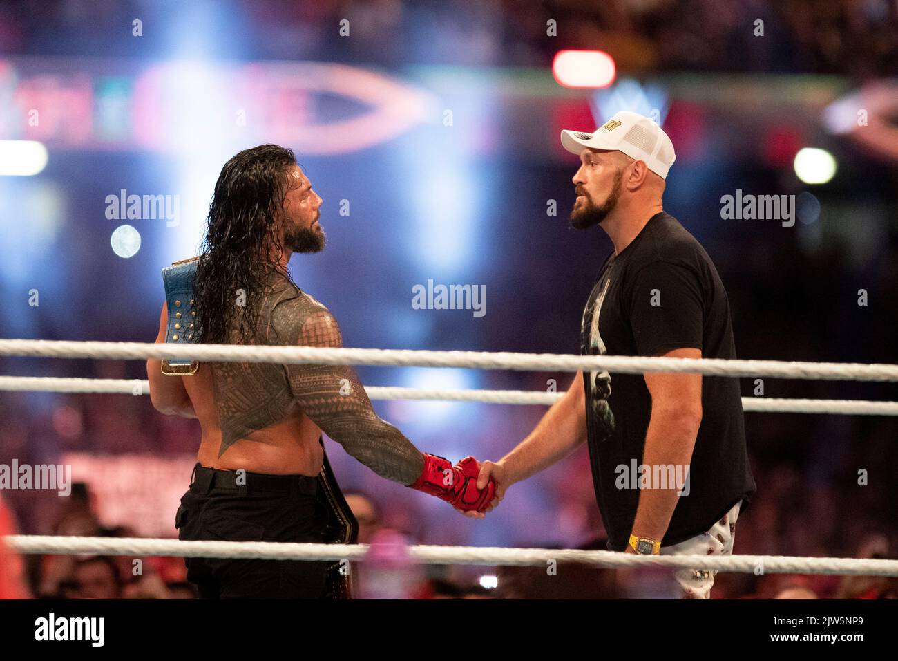 Cardiff, Wales, UK. 3rd Sep, 2022. Roman Reigns and Tyson Fury after Reigns' win over Drew ...