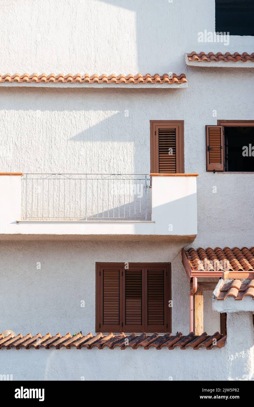 Typical white house facade part in italian city near the sea ...