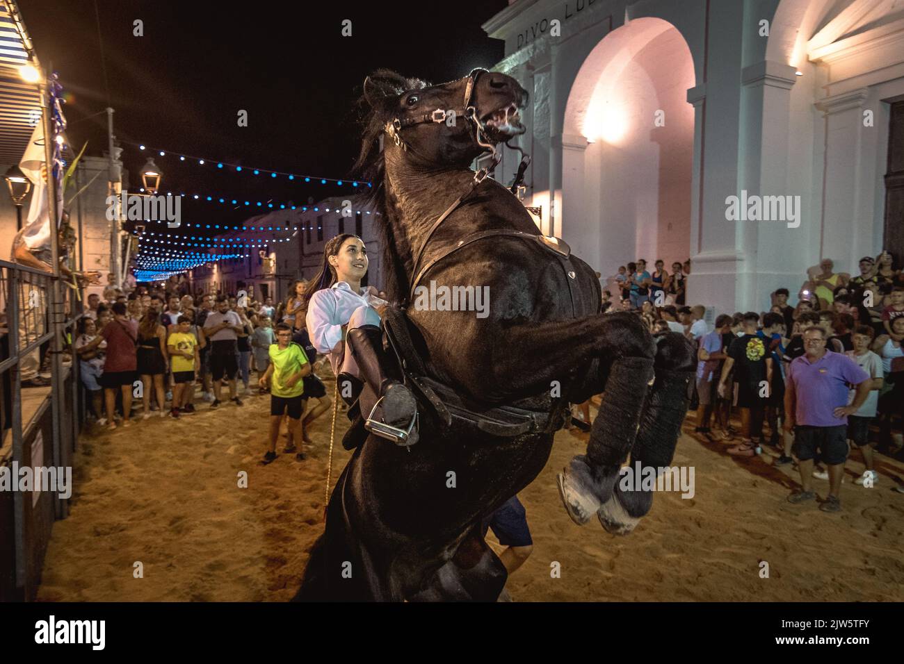 Sant Lluis, Spain. 3rd Sep, 2022. A 'caixer' (horse rider) rears up on ...