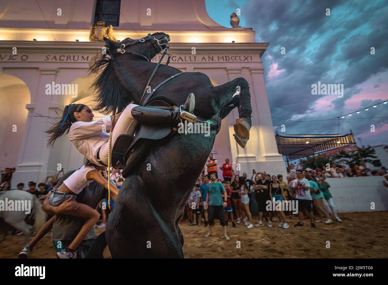 Sant Lluis, Spain. 3rd Sep, 2022. A 'caixer' (horse rider) rears up on ...