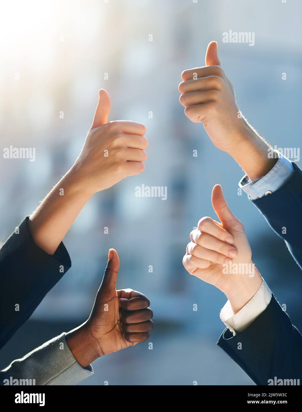 Youve done great. a group of office workers giving thumbs up together ...