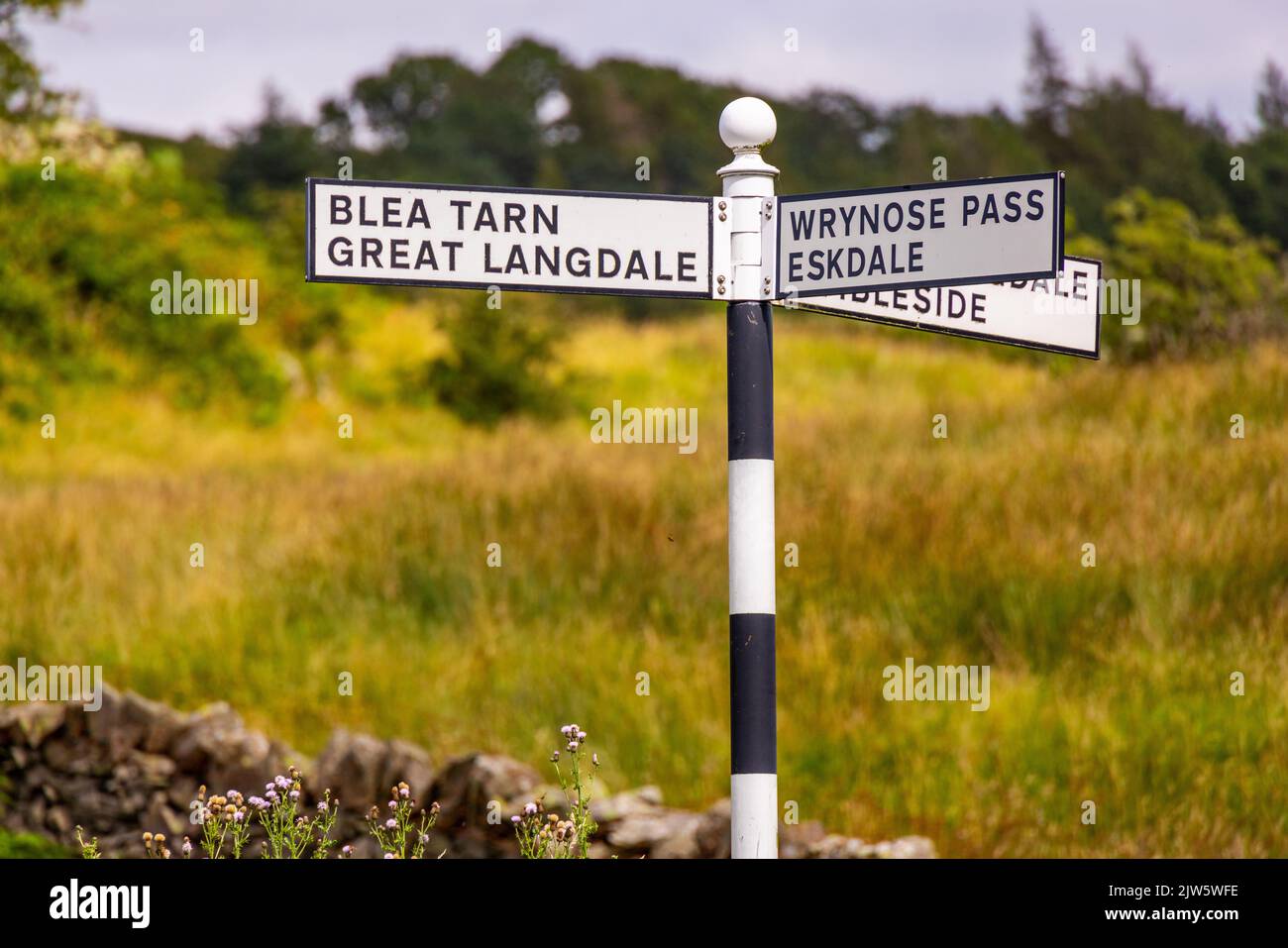 Direction signs to Wrynose and Blea Tarn at Lake District Stock Photo ...