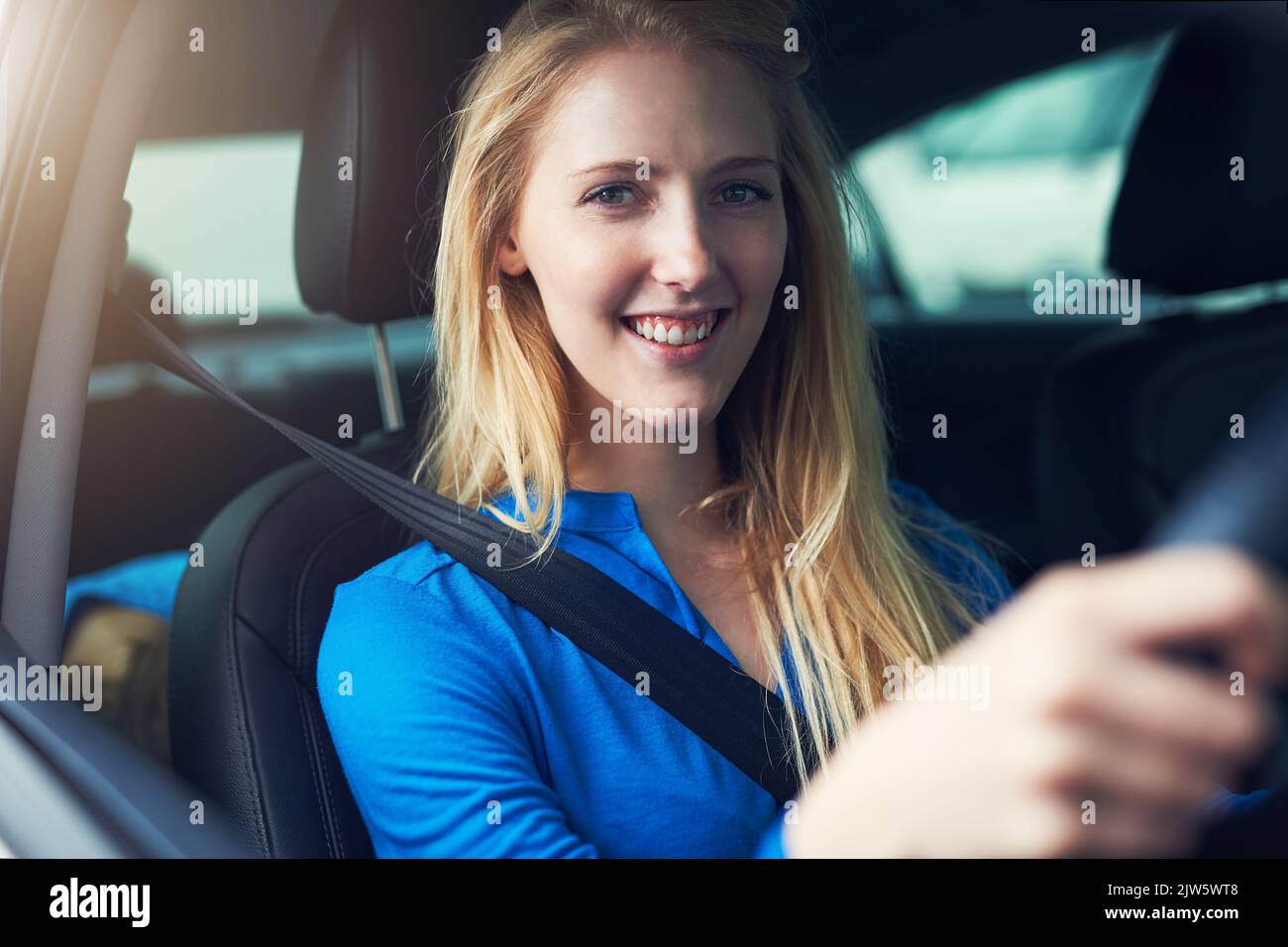 Portrait confident woman driving car hi-res stock photography and ...