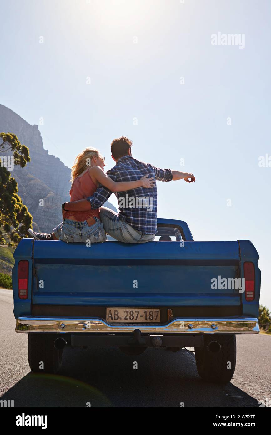 Theres adventure around every corner. a young man pointing toward ...