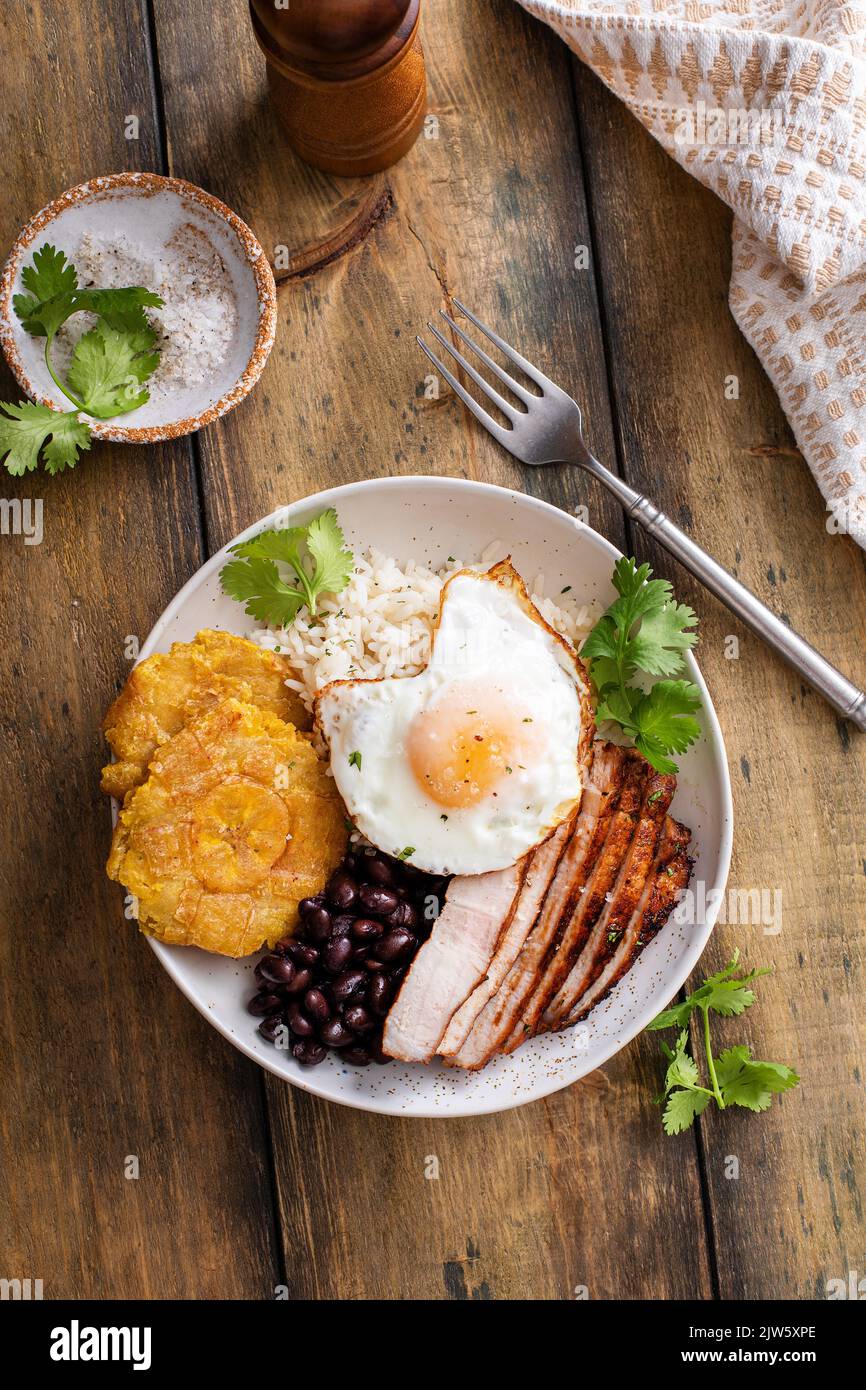 Caribbean or latin american breakfast with rice, beans and pork Stock ...